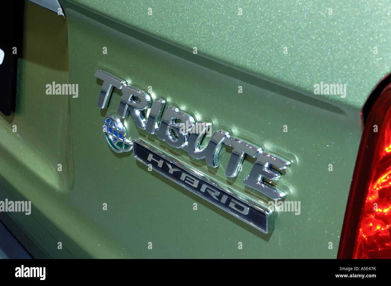 2007 Mazda Tribute Hybrid detail showing name plate Stock Photo - Alamy
