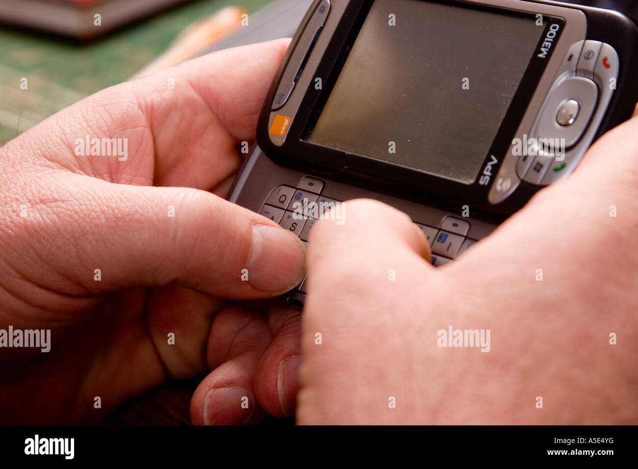 Farmer working in the farm office on paperwork Stock Photo - Alamy