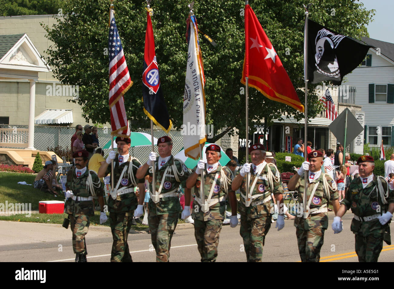 A group of soldiers with flags marching Stock Photo - Alamy