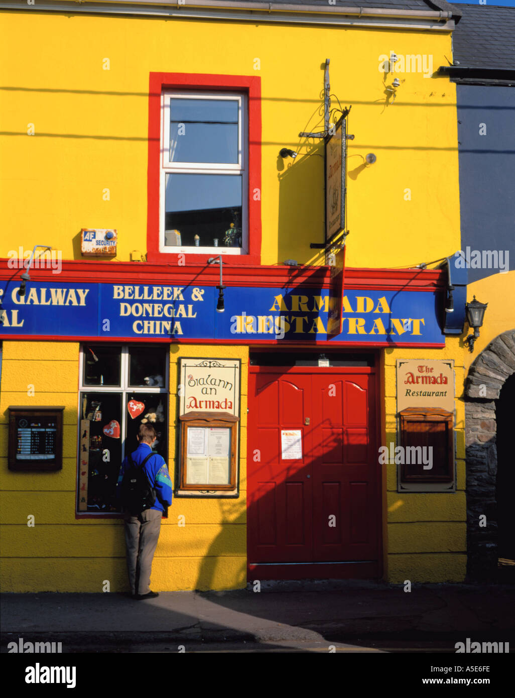 Brightly coloured shop front, Dingle village, Dingle Peninsula, County ...