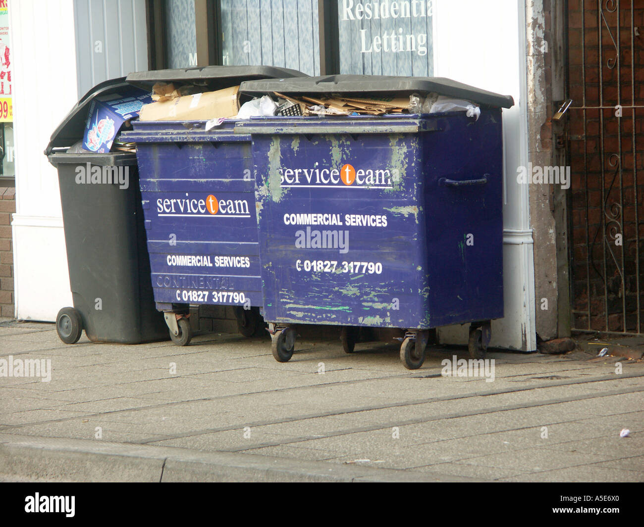 Commercial waste bins outside an office awaiting collection Stock Photo ...