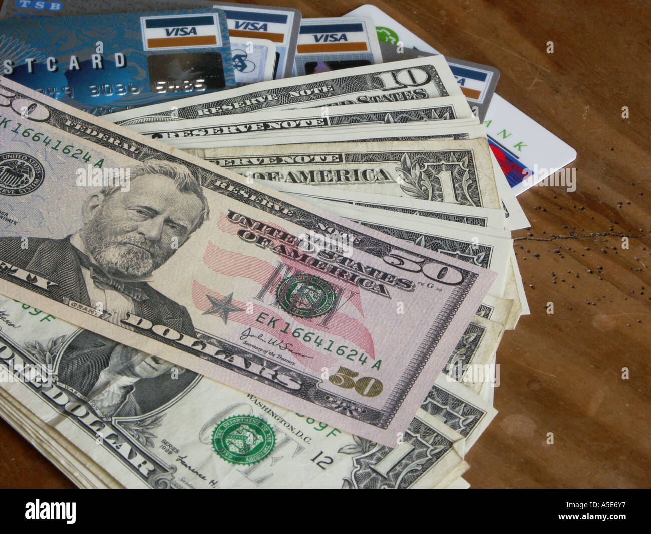 American dollar bills or notes of various denominations alongside ...