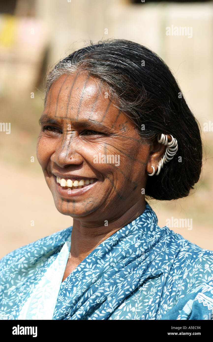 Kutia Kondh tribal woman. wearing traditional haipins in her hait and a ...