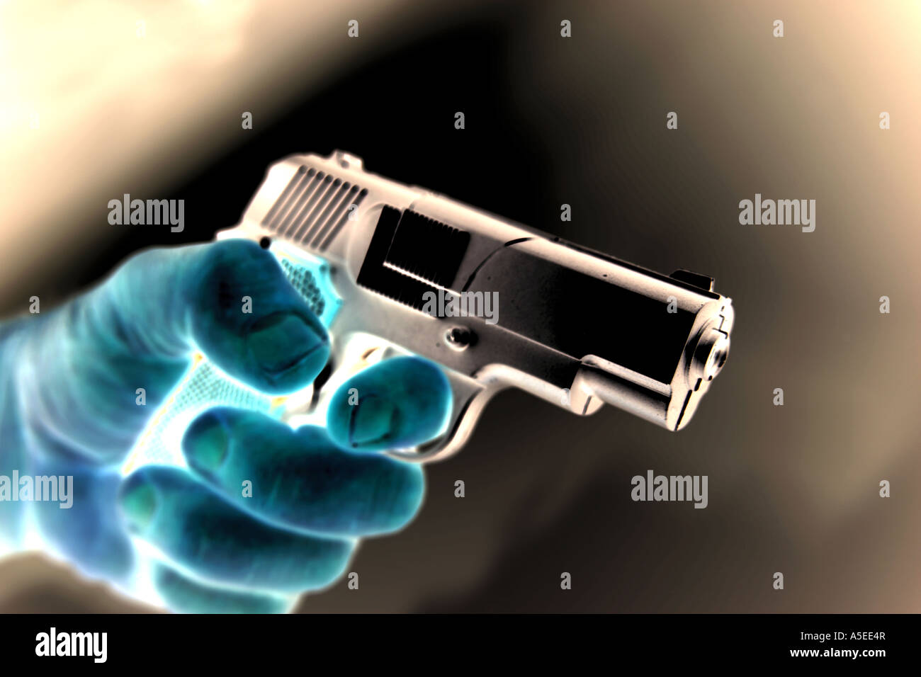 Gun in hand Stock Photo - Alamy