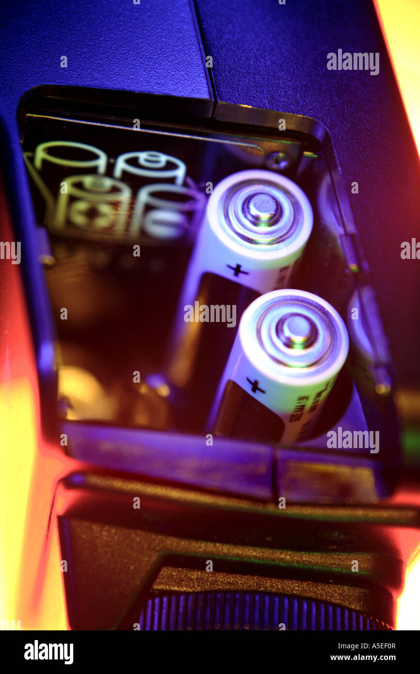 Batteries in compartment of device Stock Photo - Alamy