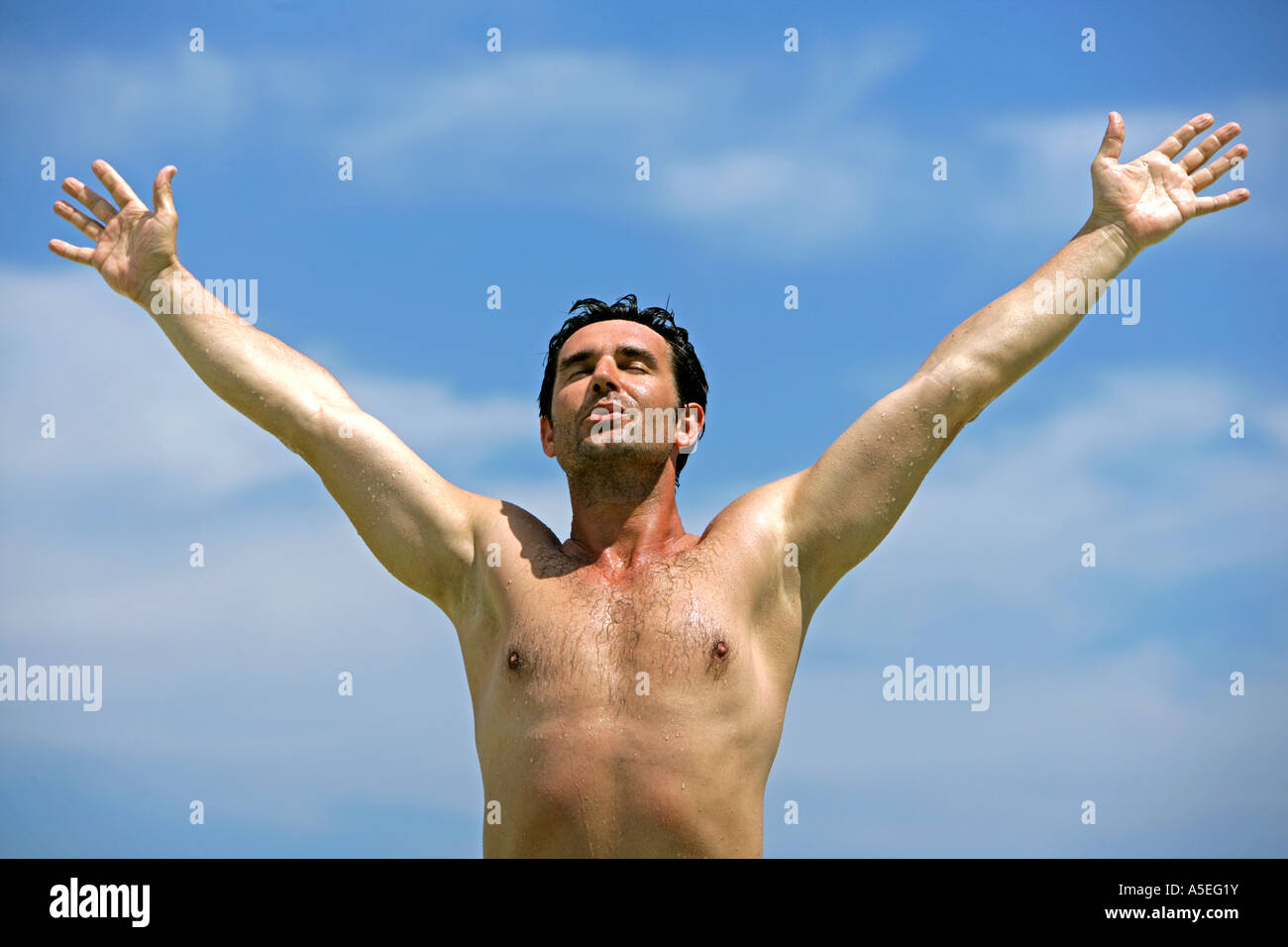 Man enjoying holidays at tropical beach in Thailand Stock Photo - Alamy