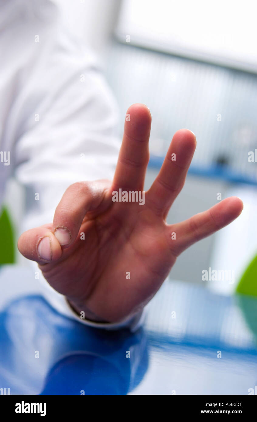 Businessman giving the ok sign Stock Photo - Alamy