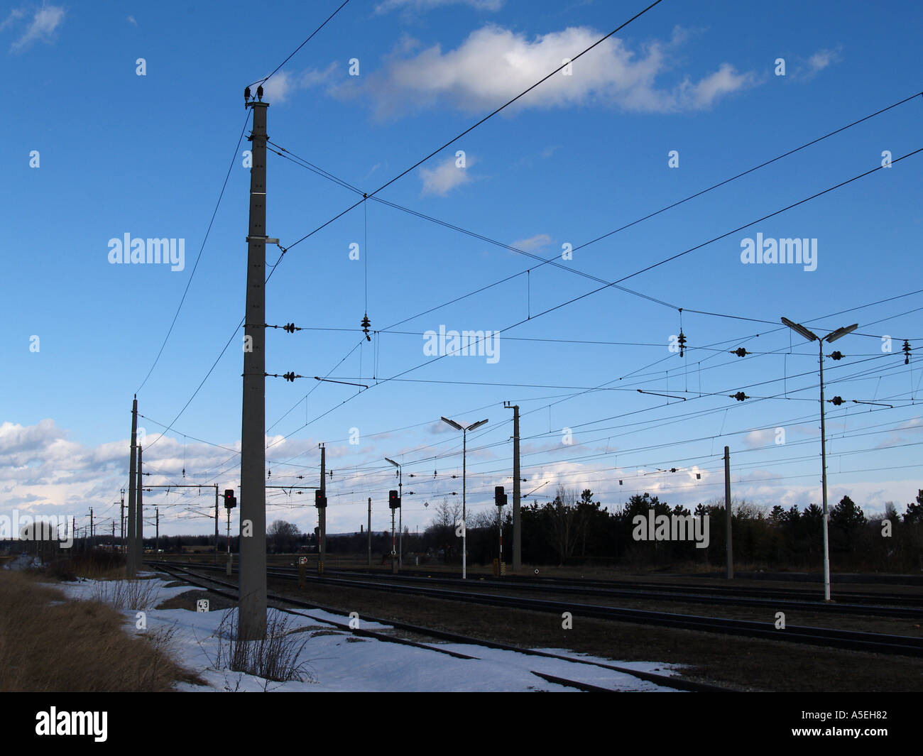 overhead contact line along the tracks Stock Photo - Alamy