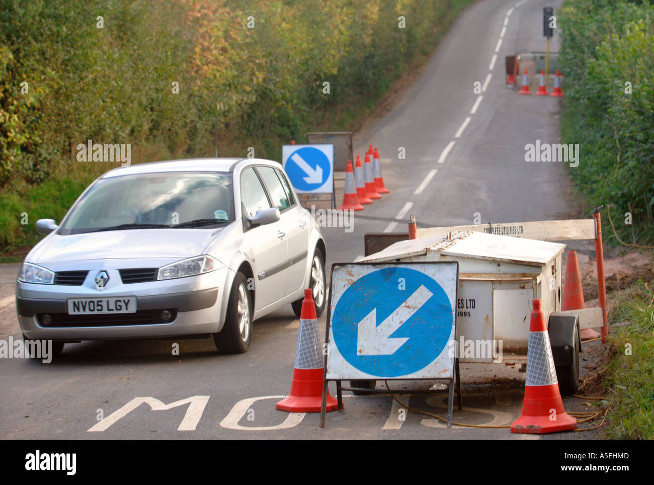 A MOBILE GENERATOR BEING USED TO POWER TEMPORARY TRAFFIC LIGHTS AT A ...