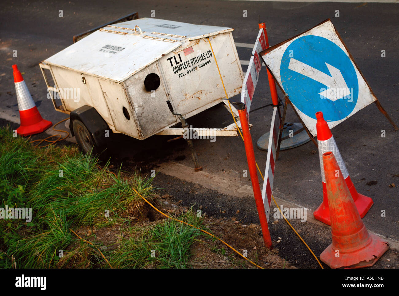 A MOBILE GENERATOR BEING USED TO POWER TEMPORARY TRAFFIC LIGHTS AT A ...