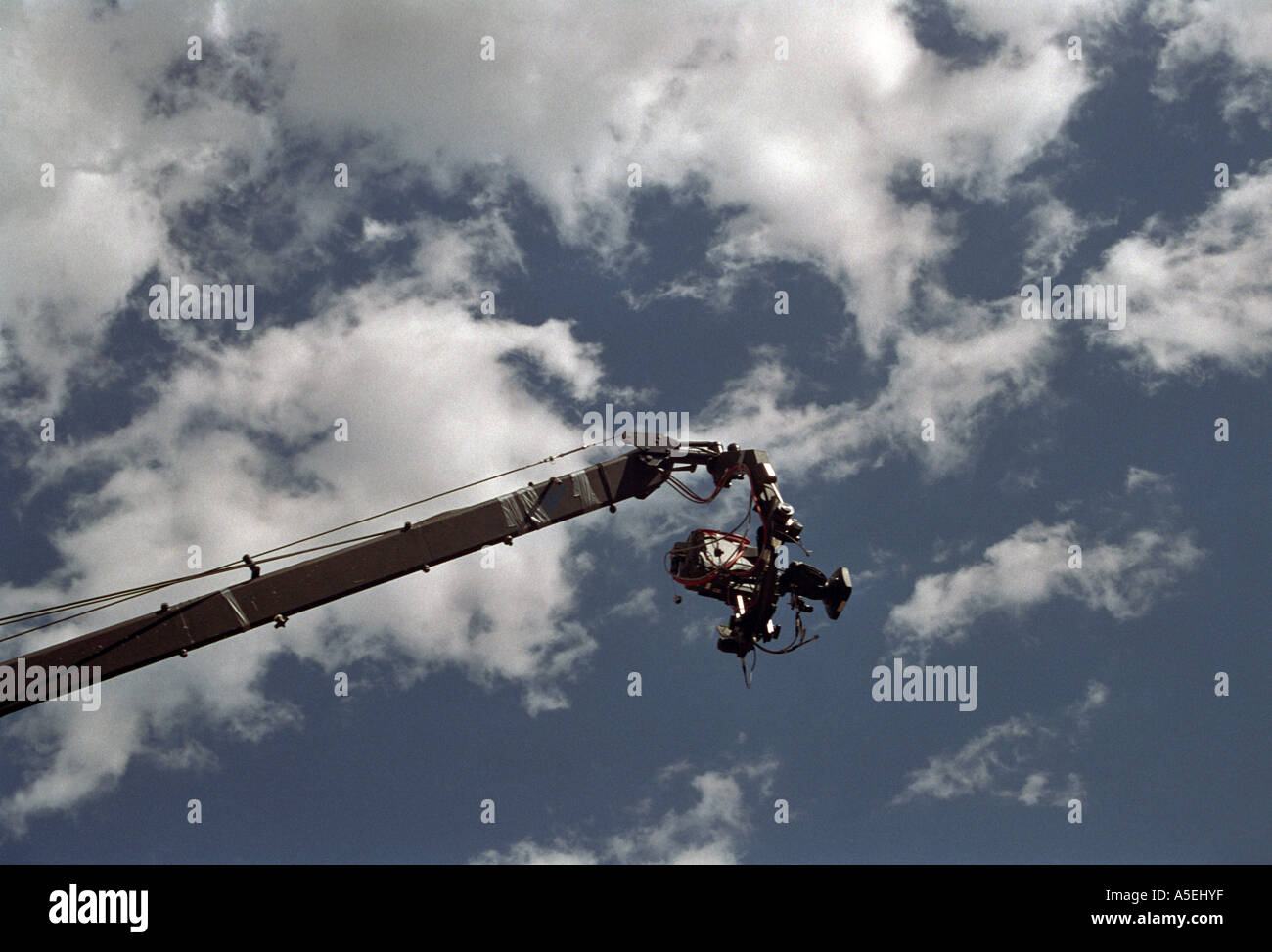 tv camera on crane boom Stock Photo - Alamy