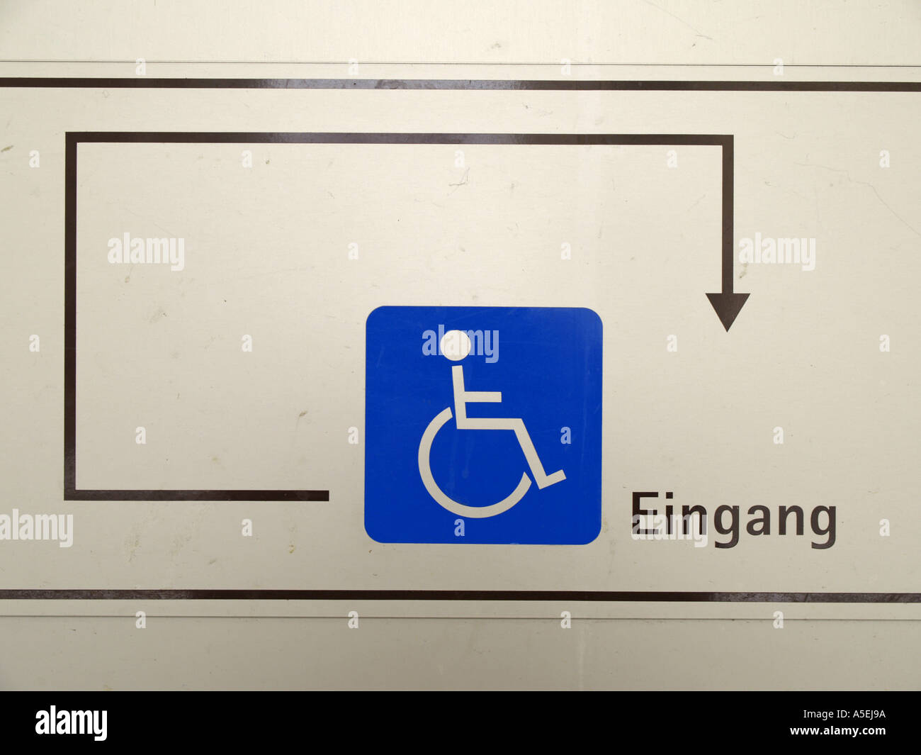 direction sign to the entrance for disabled people Stock Photo - Alamy
