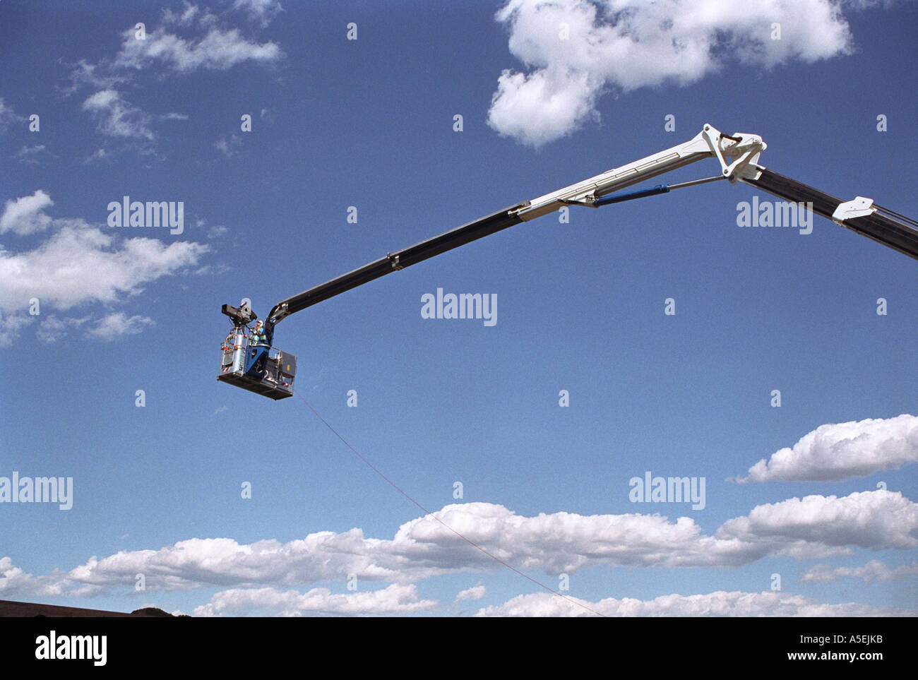 tv camera on crane boom and sky Stock Photo - Alamy