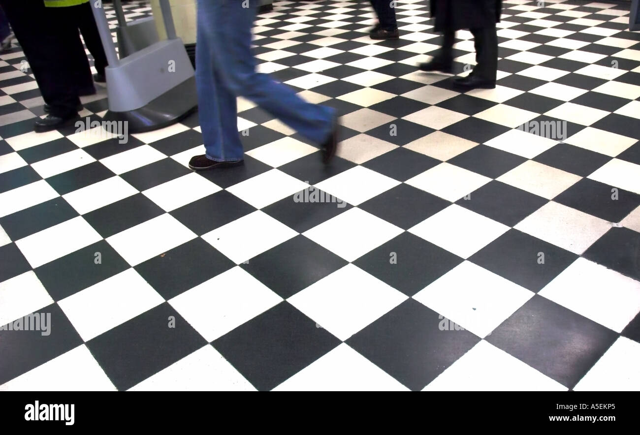 Legs of commuters rushing through london underground station Stock ...