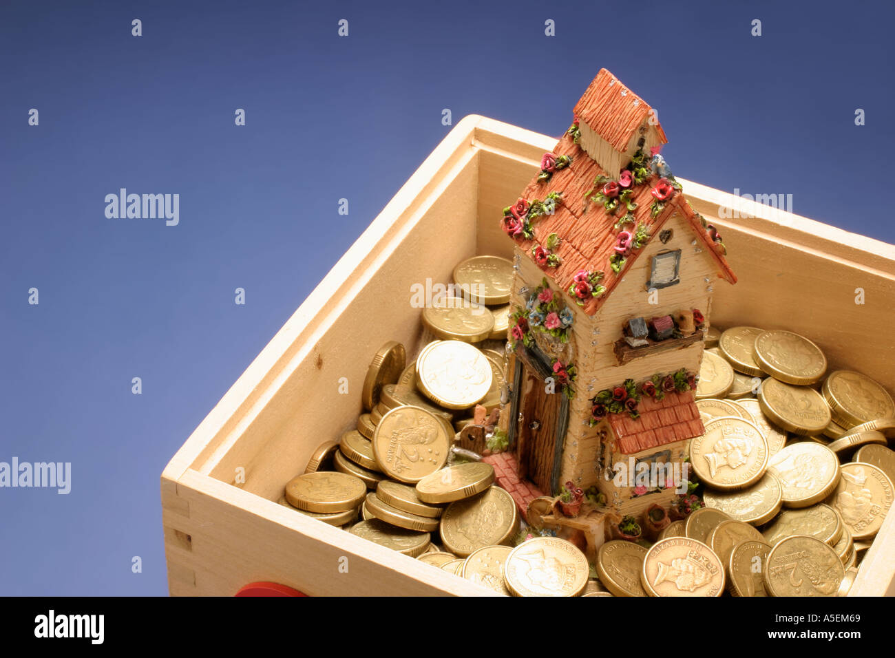 Coins in wooden box hi-res stock photography and images - Alamy