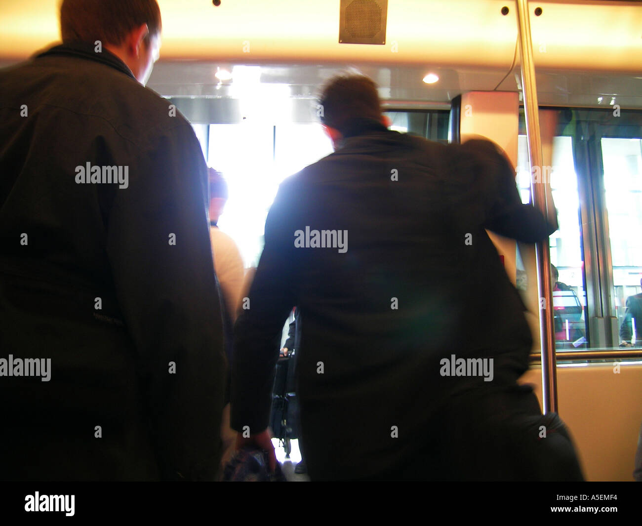 men on train passengers on train the metro the train Stock Photo - Alamy