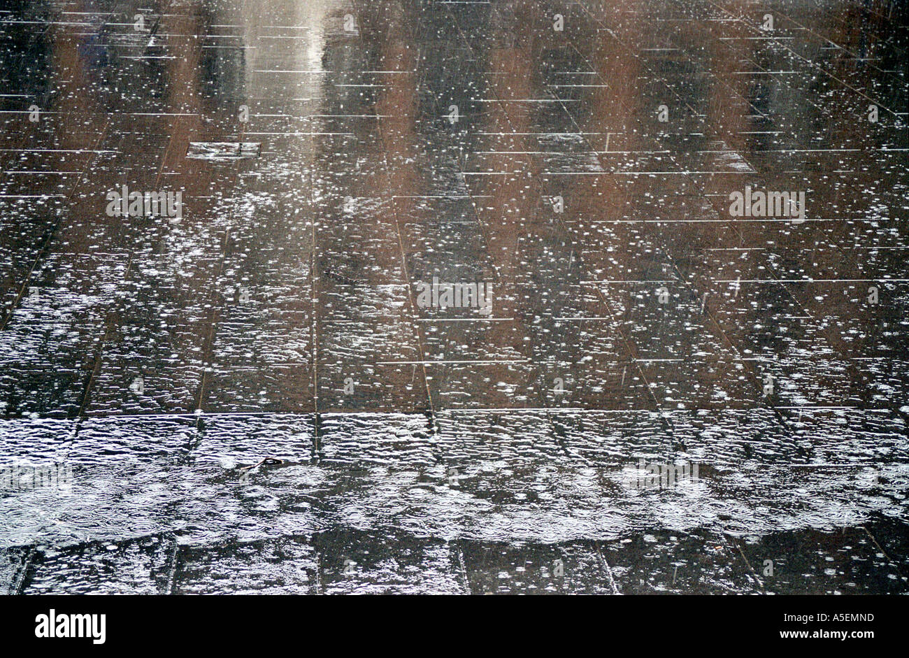 rain falling on pavement Stock Photo - Alamy
