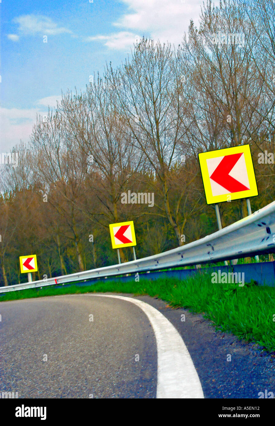 Sign boards in Dangerous curve Stock Photo - Alamy