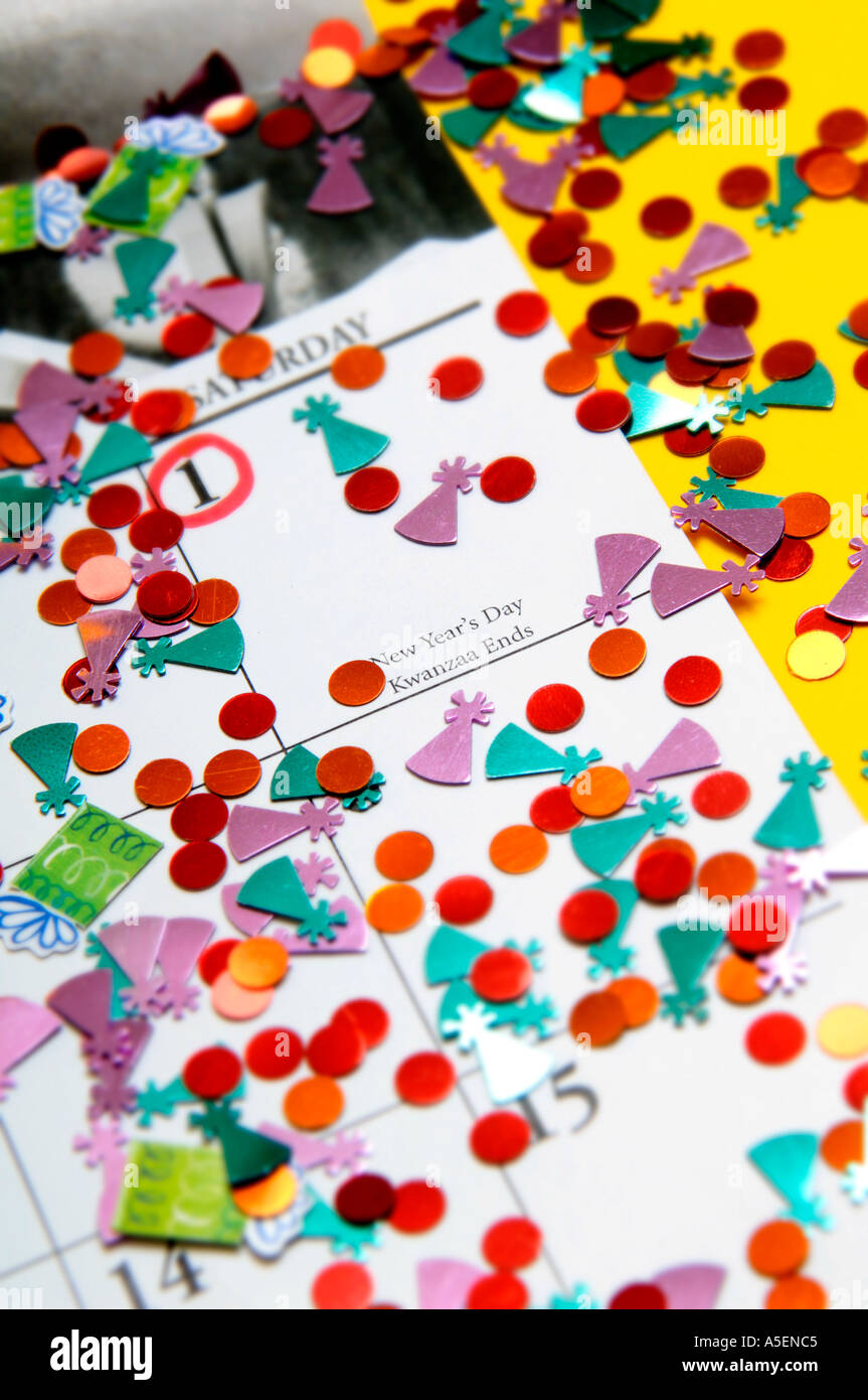 Calendar with confetti and New Years Day circled Stock Photo - Alamy