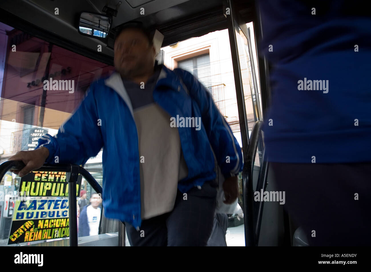 man goes up on a bus - xochimilco - mexico Stock Photo - Alamy