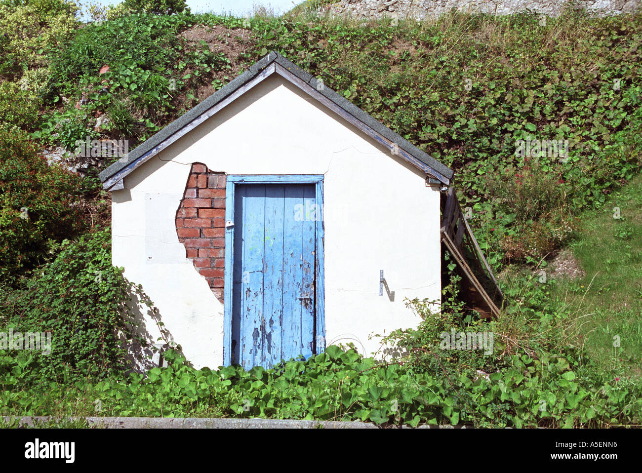 old hut with blue door Stock Photo - Alamy