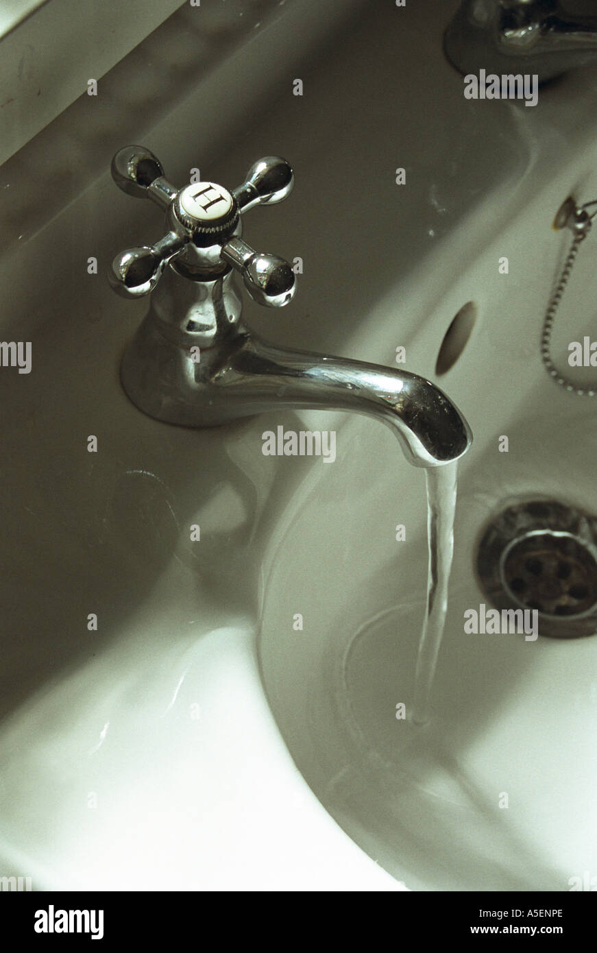 running water tap and sink Stock Photo - Alamy