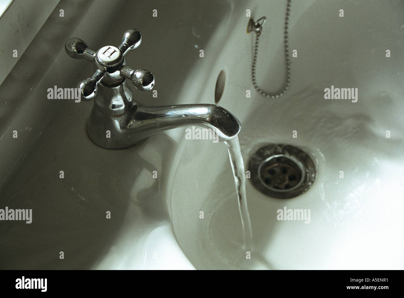 running water tap and sink Stock Photo - Alamy