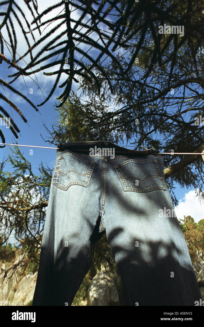 jeans on washing line Stock Photo - Alamy