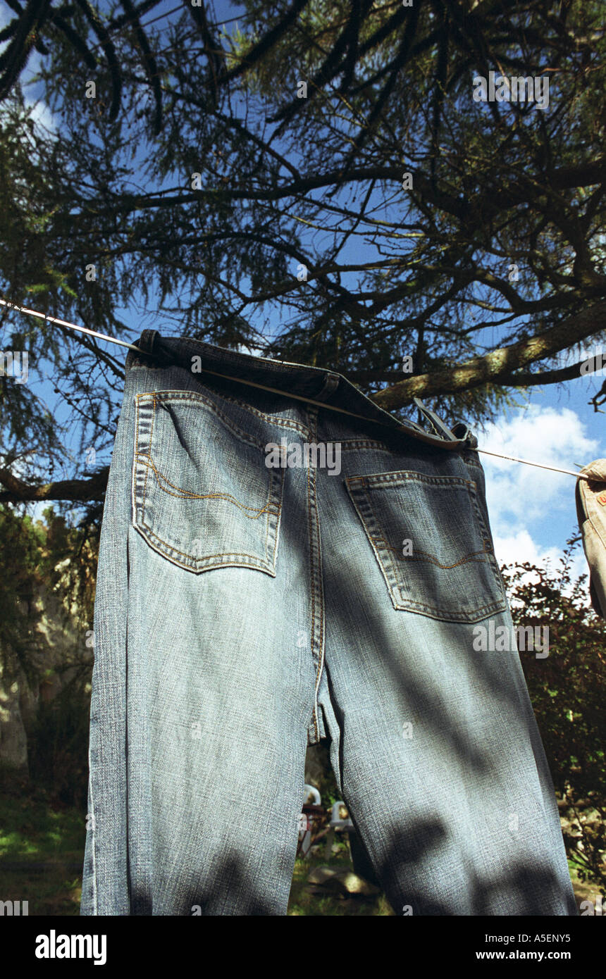 jeans on washing line Stock Photo - Alamy