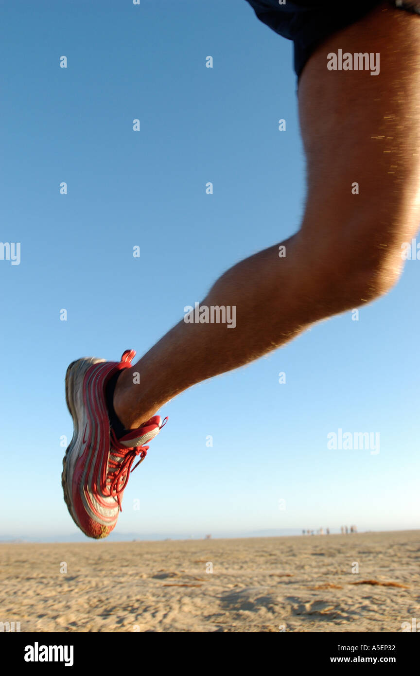 leg in motion leg of person running with sport shoe Stock Photo - Alamy