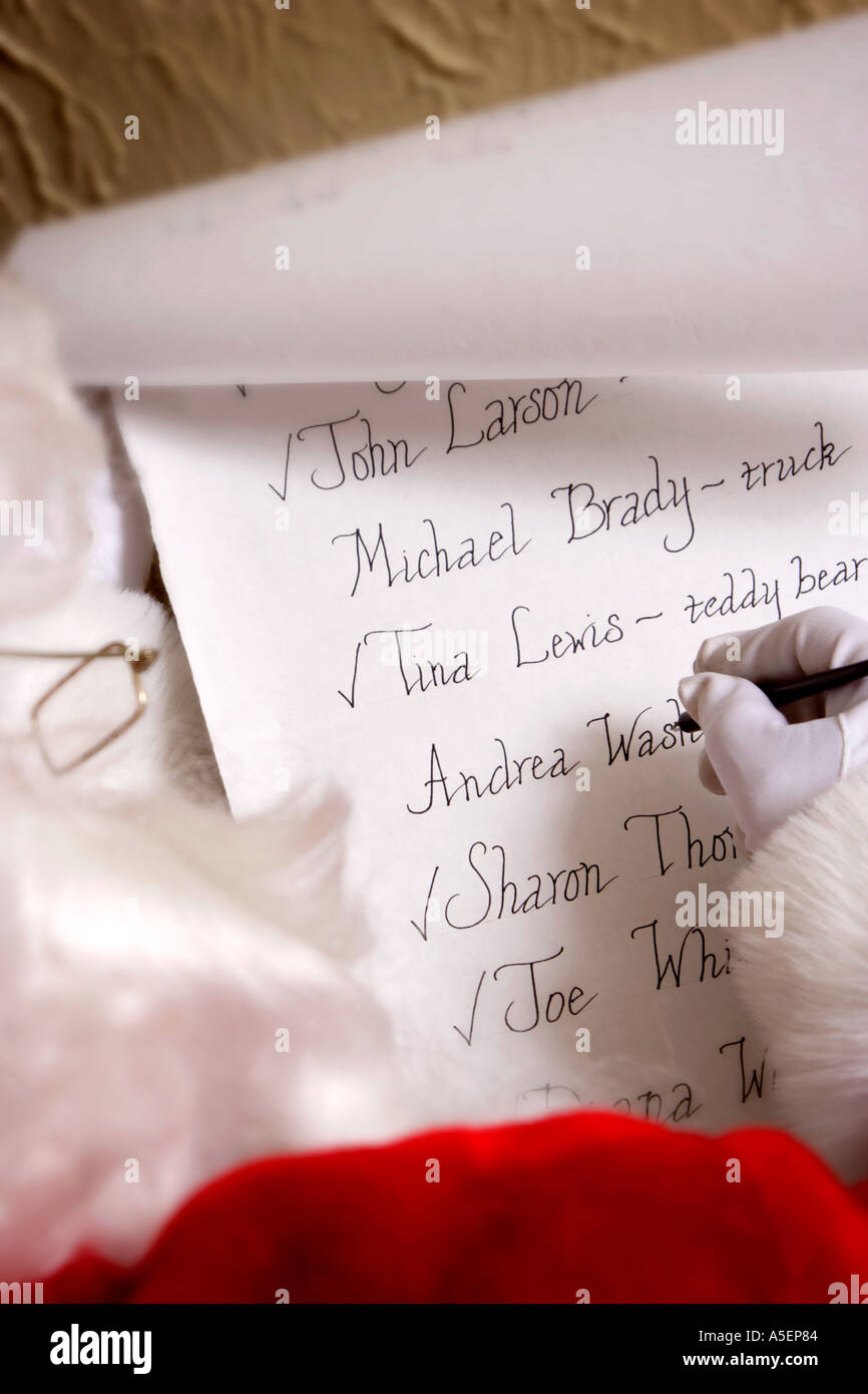 Santa with list Stock Photo - Alamy