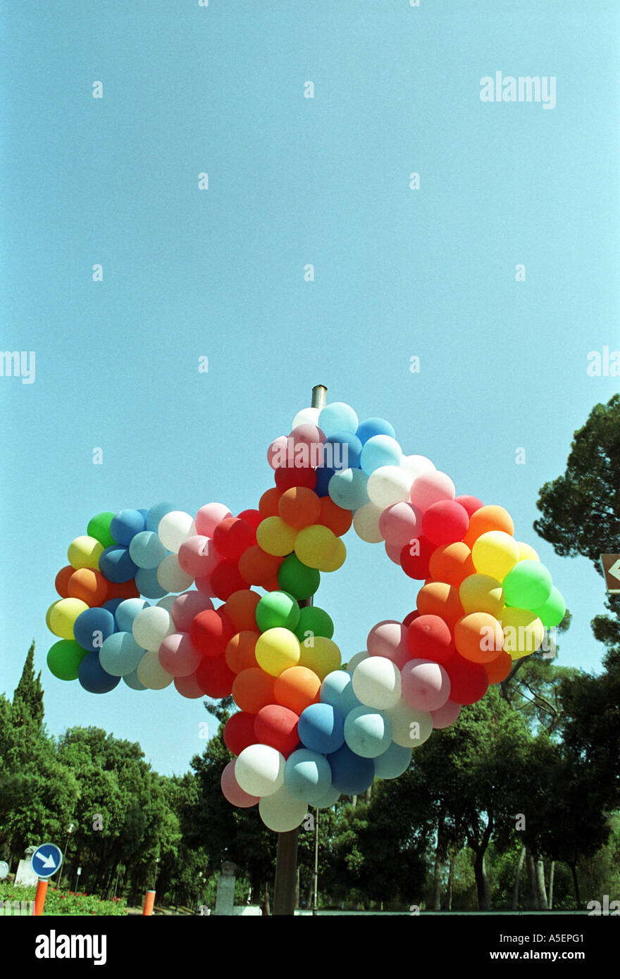 arrow shape colourful balloons Stock Photo - Alamy