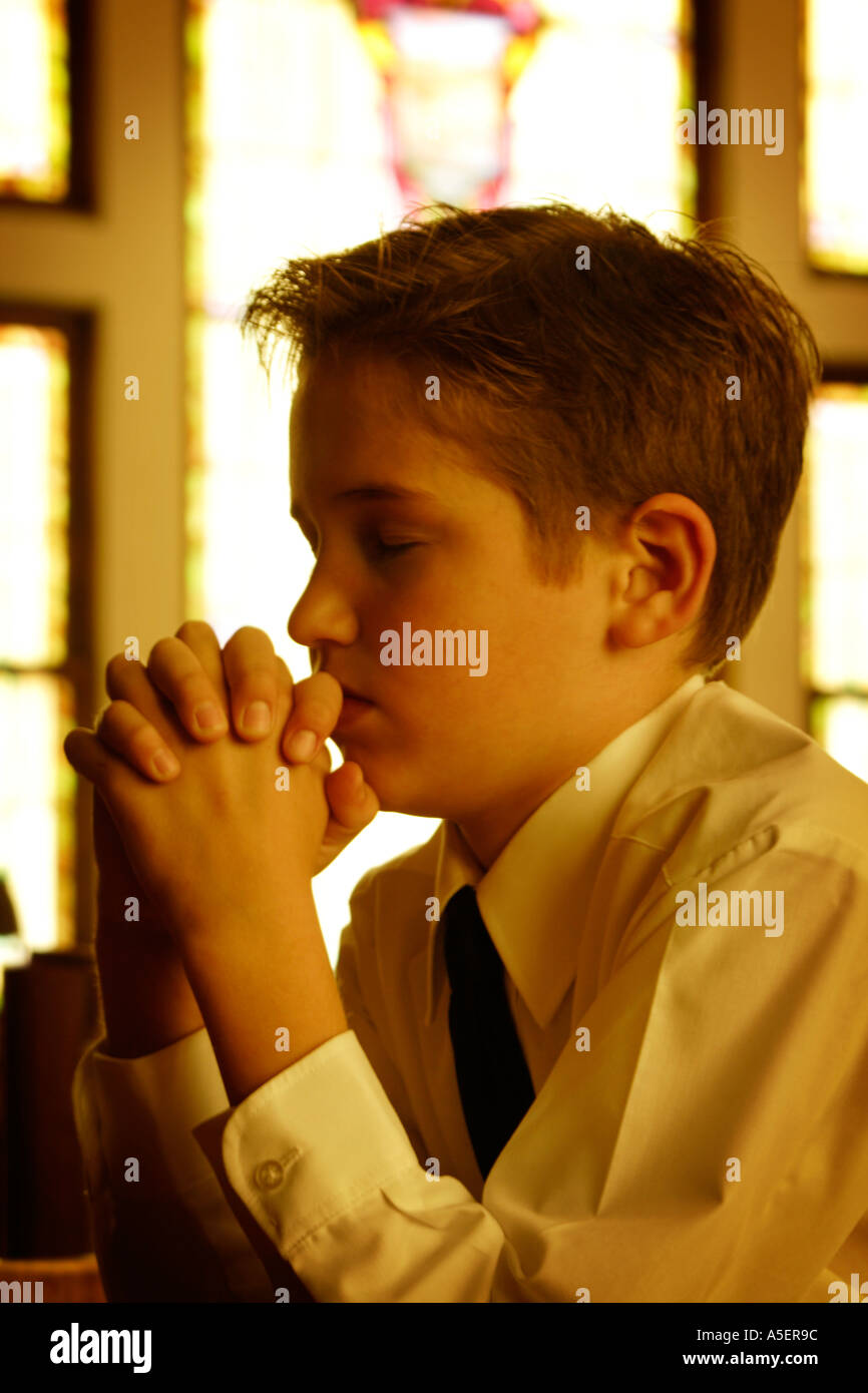 Boy praying christian 8 9 years hi-res stock photography and images - Alamy