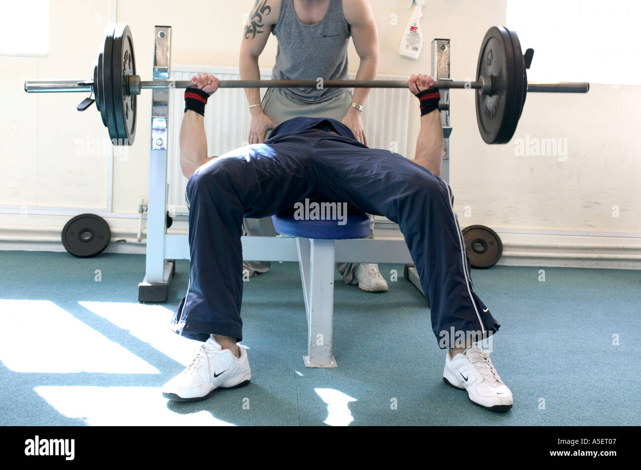 Gym weights track suit hi-res stock photography and images - Alamy