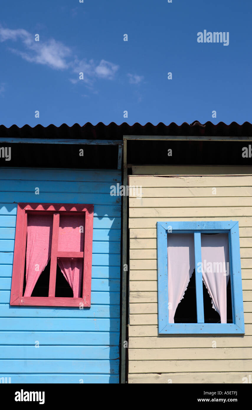 Blue red and yellow window frames against blue sky Stock Photo - Alamy
