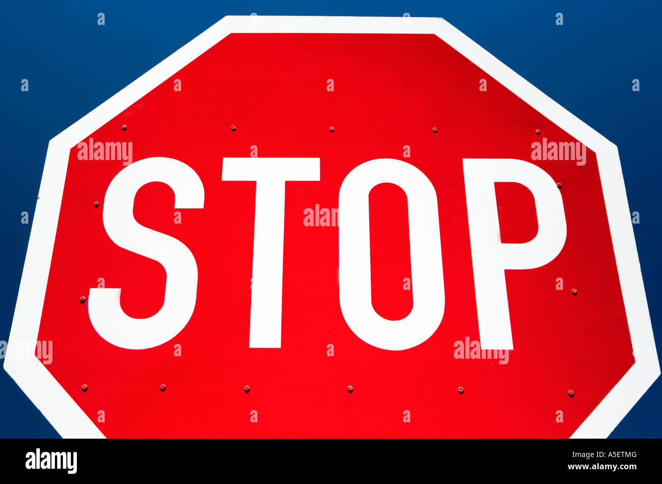 Stop sign road close up Stock Photo - Alamy