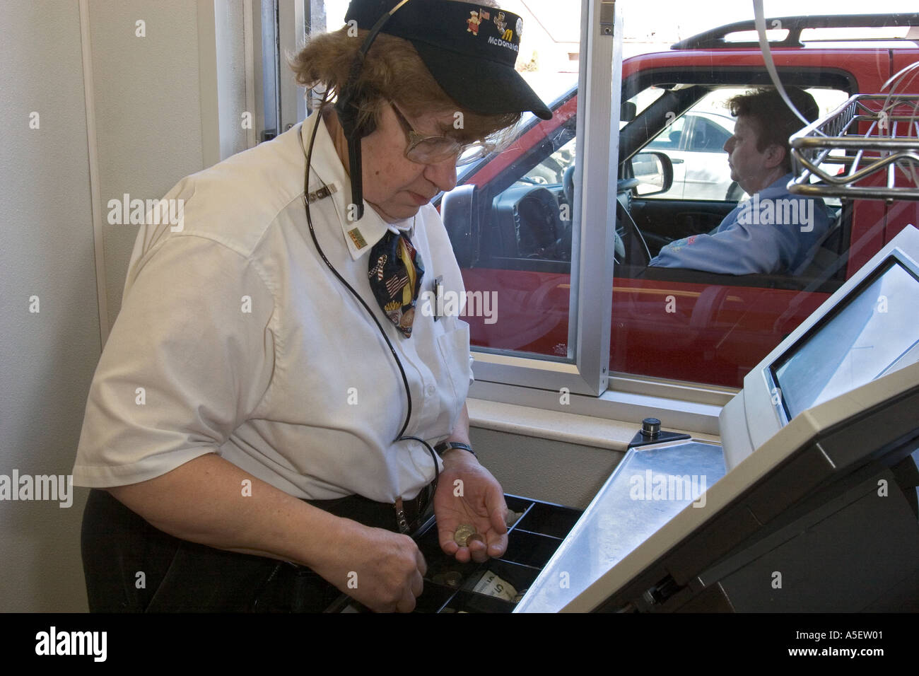 Worker at McDonalds Restaurant Stock Photo - Alamy