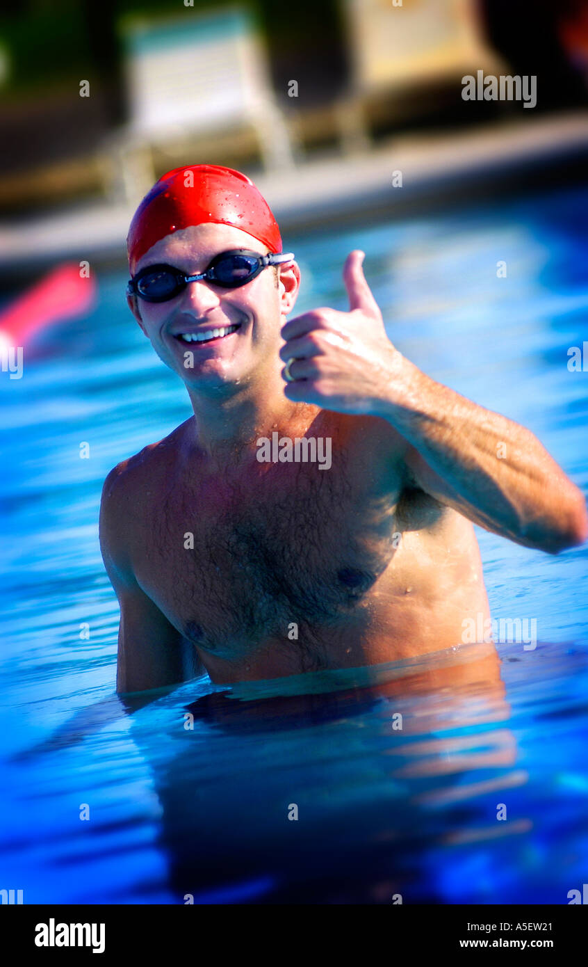 Muscular man standing in swimming hi-res stock photography and images ...