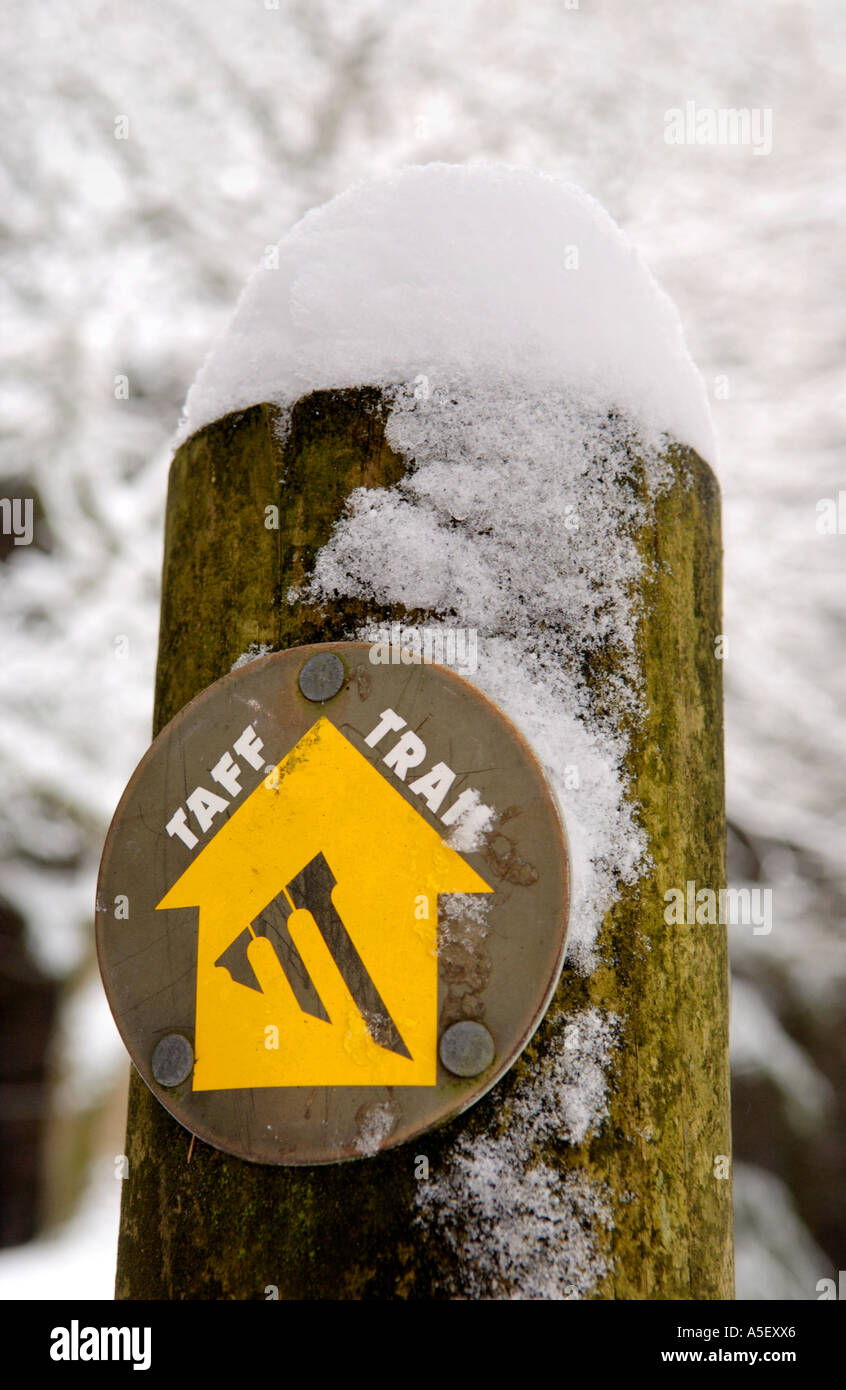 Countryside Taff Trail footpath signs in winter snow in the Brecon ...