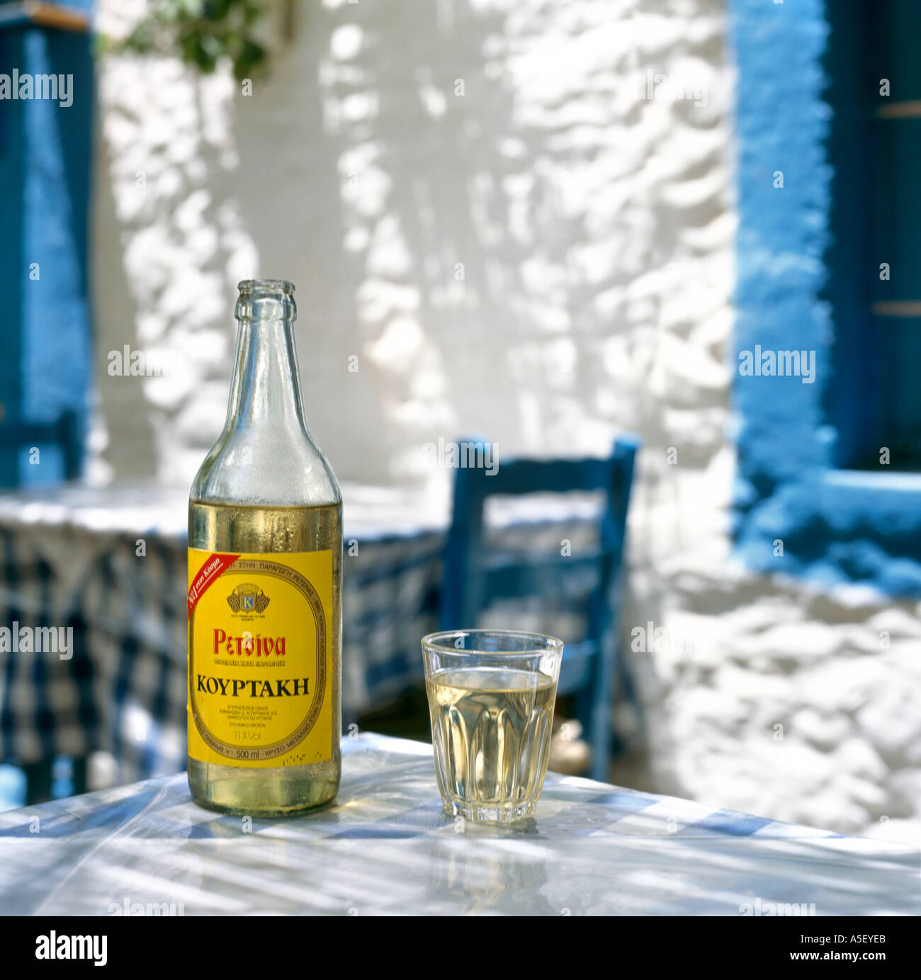 Bottle of Retsina wine in a traditional taverna in the village of Zia ...