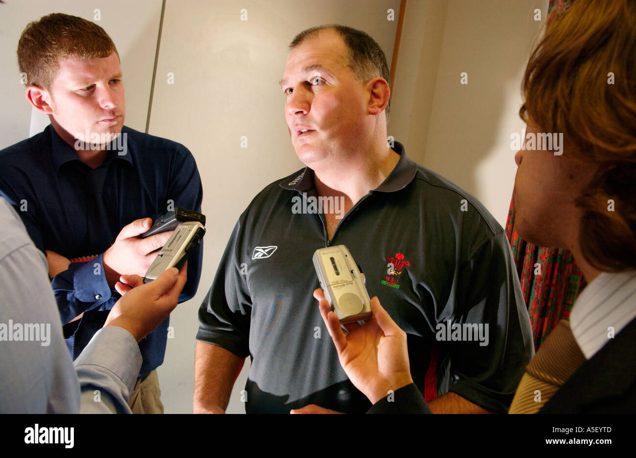 Professional rugby coach Mike Ruddock doing media interviews while ...