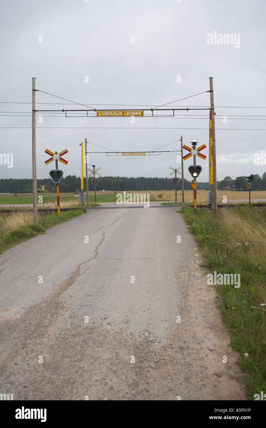 Railway crossing in Sweden Stock Photo - Alamy