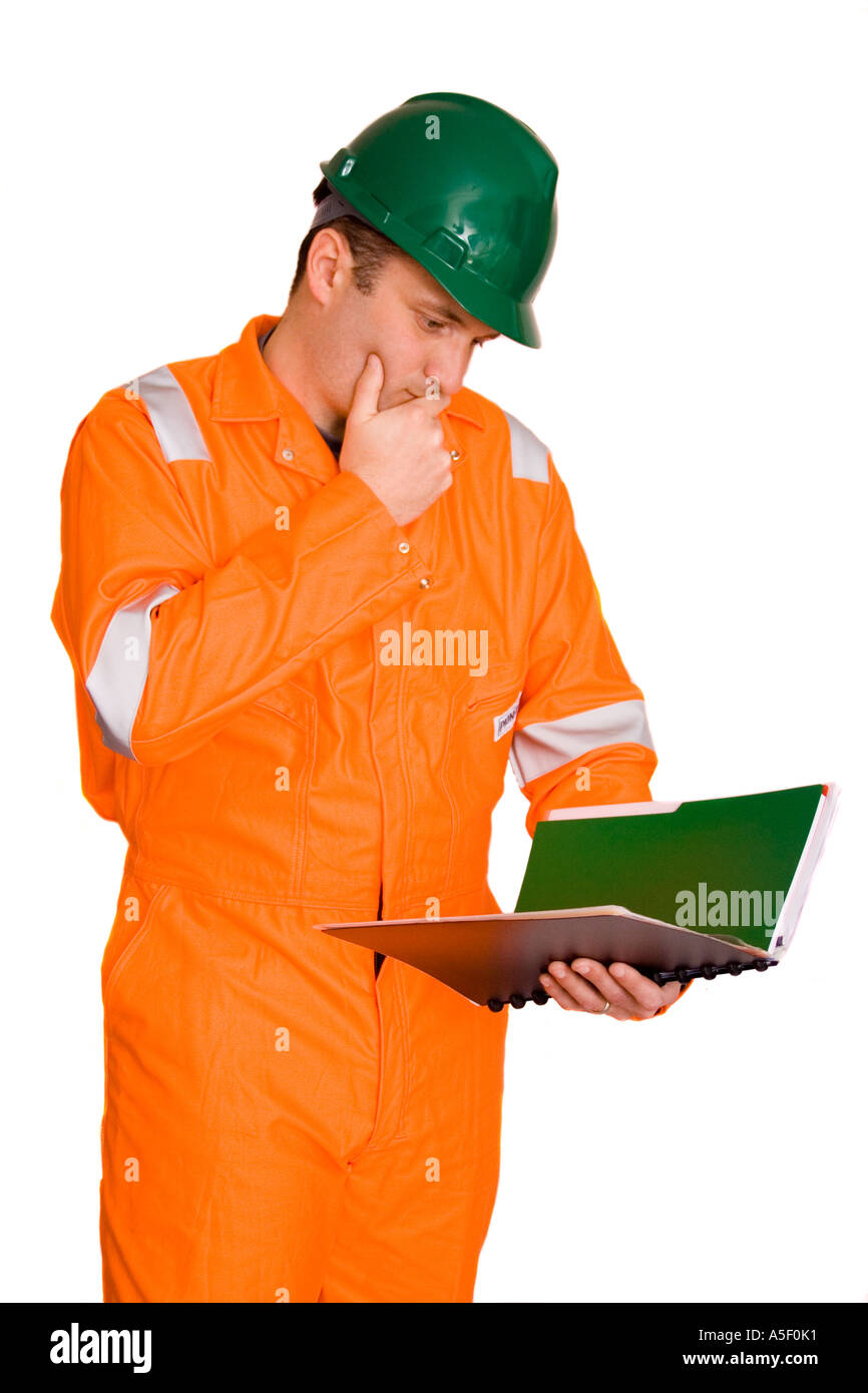Engineer in orange overalls and hard hat Stock Photo - Alamy