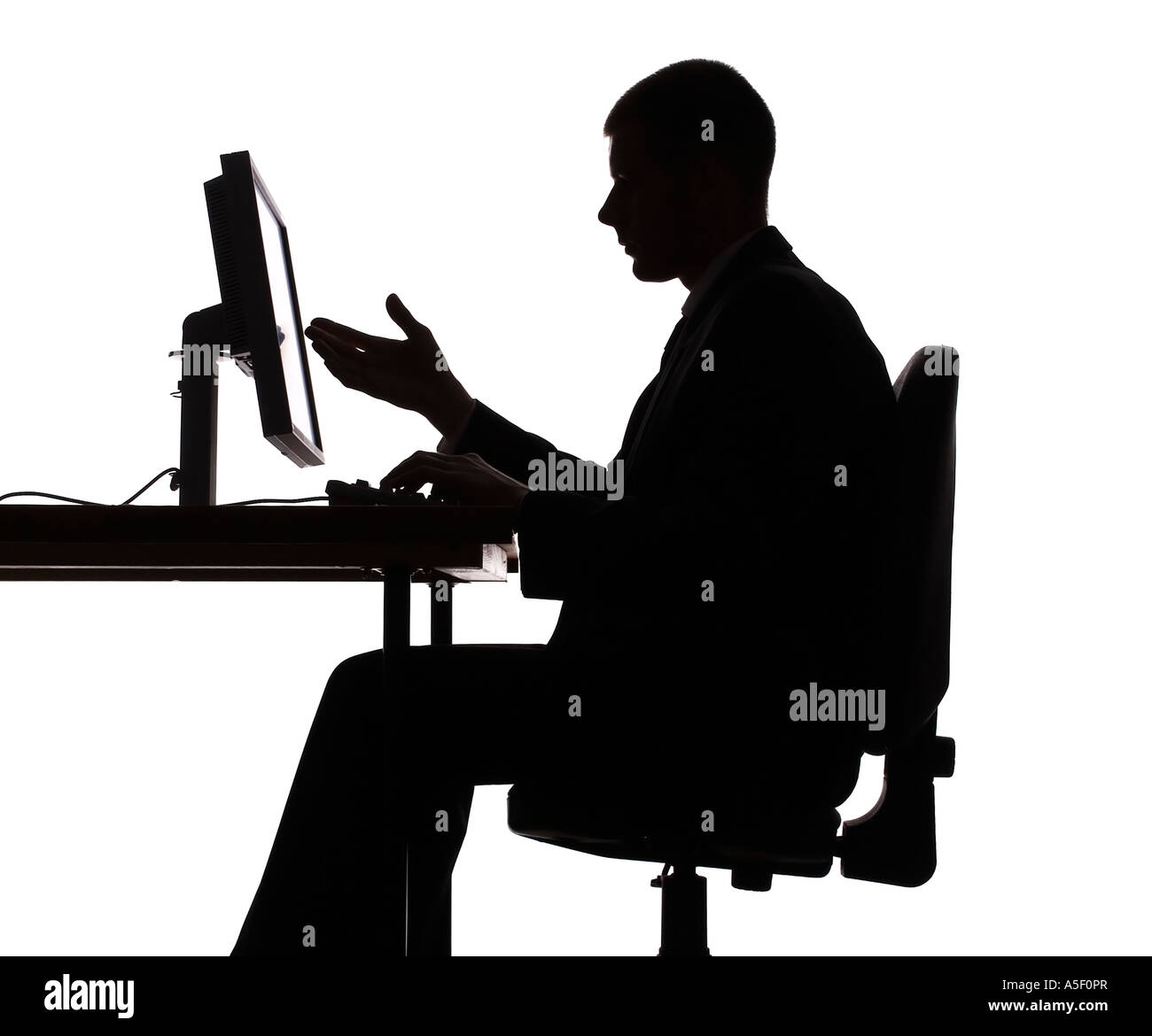 Silhouette man computer Cut Out Stock Images & Pictures - Alamy