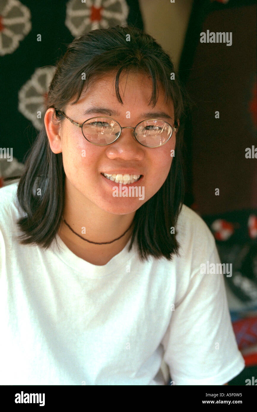 Asian teen girl age 17 enjoying herself at Cedarfest. Minneapolis ...