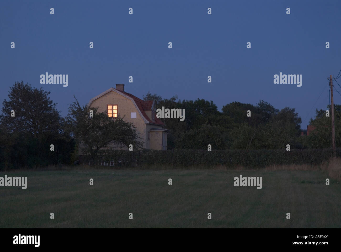 Remotely situated house at night Stock Photo - Alamy