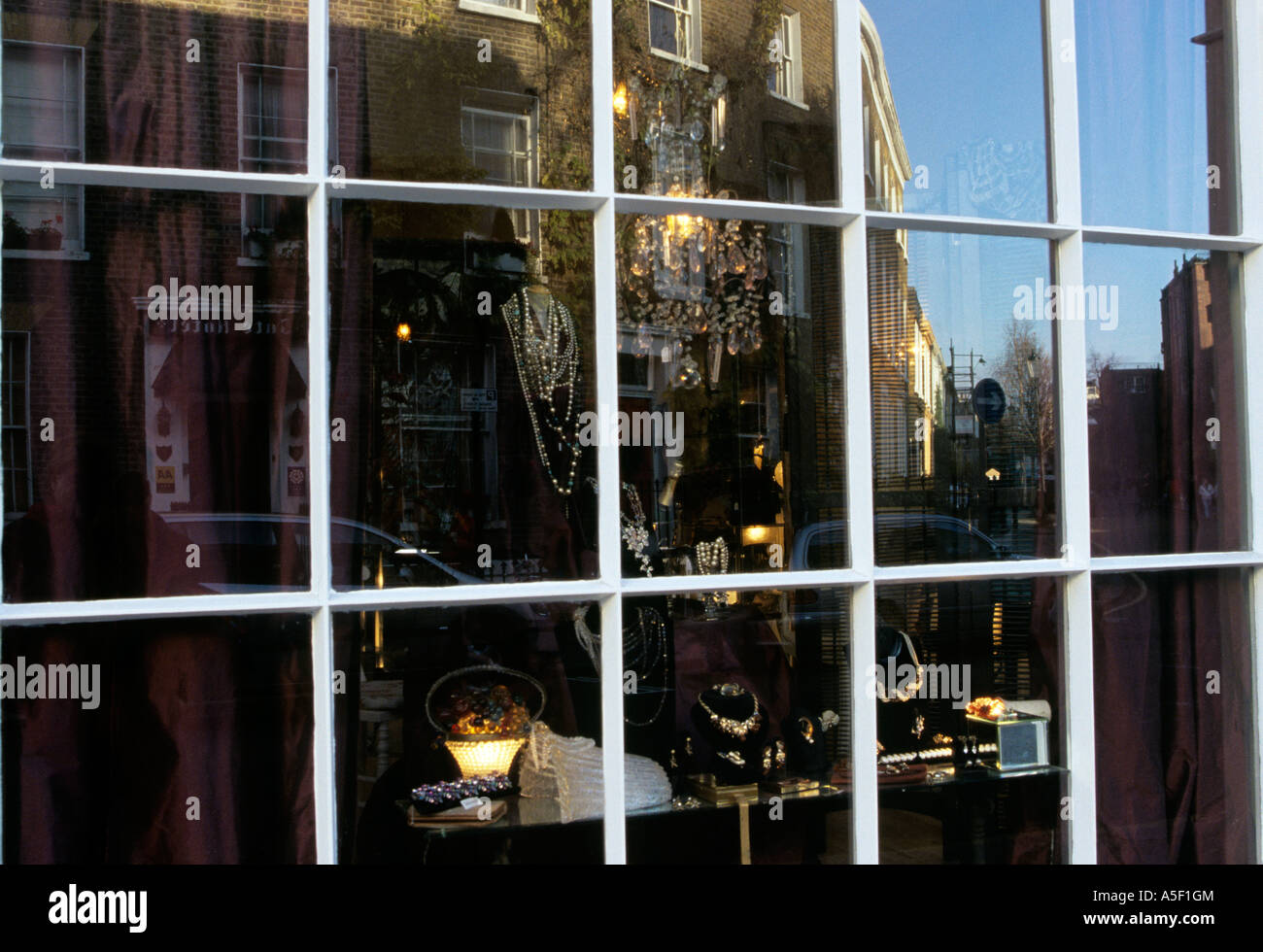 Reflections on the window of a jewelry store Stock Photo - Alamy