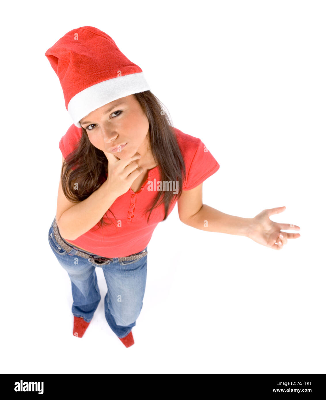 isolated on white young and attractive female Santa thinking Stock ...