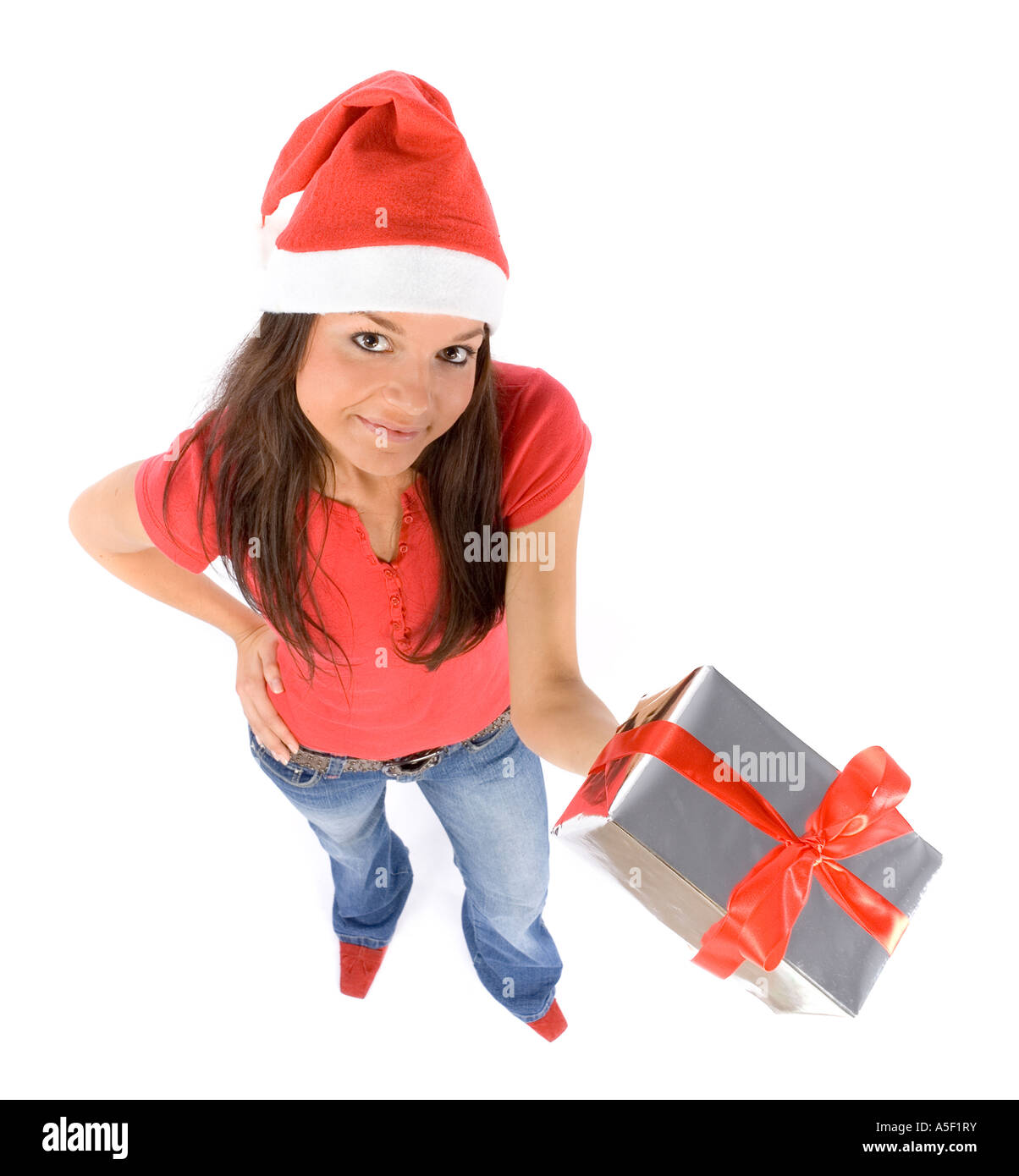 isolated on white young female Santa with gift Stock Photo - Alamy