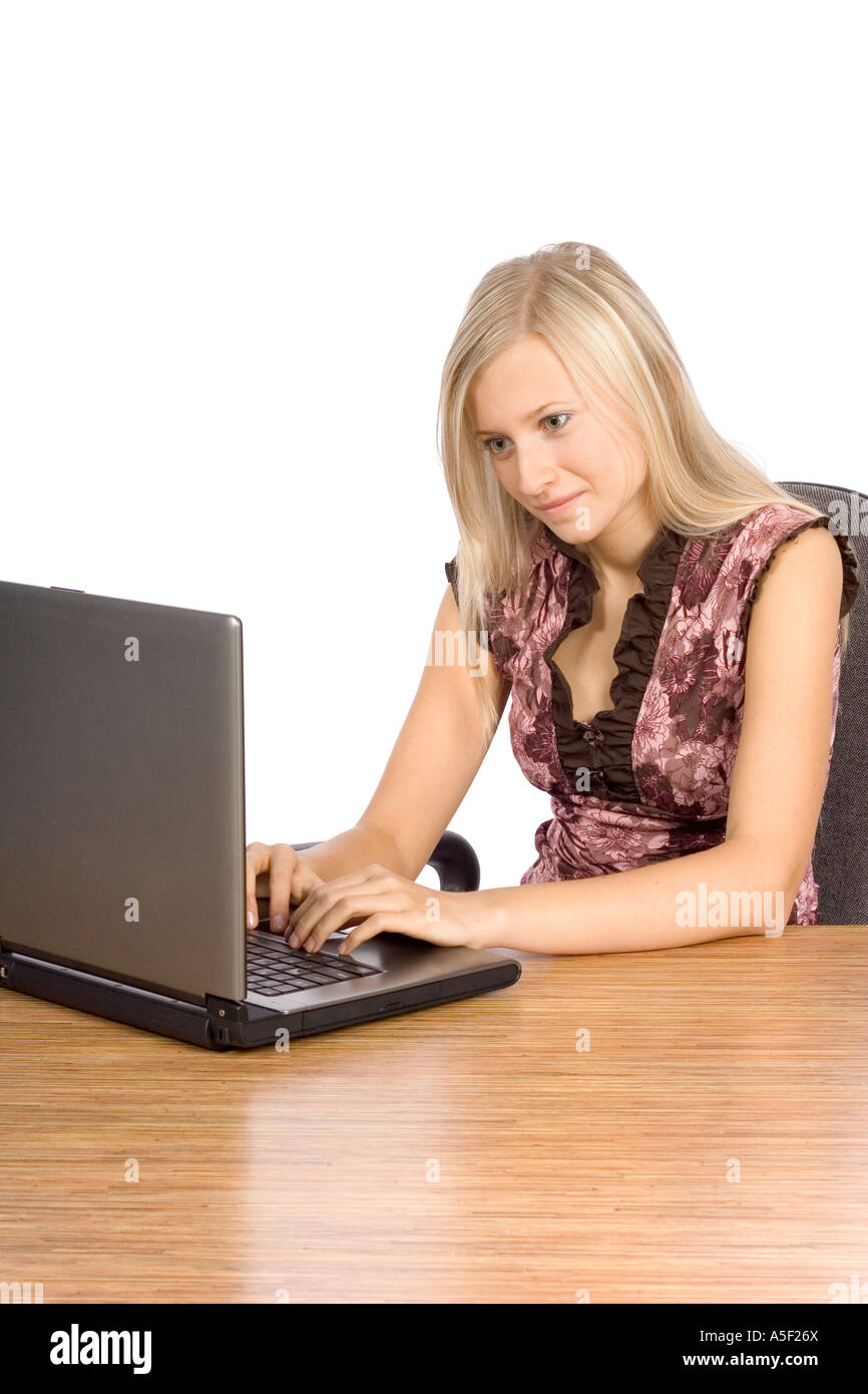 isolated on white young blonde woman at the desk working laptop Stock ...
